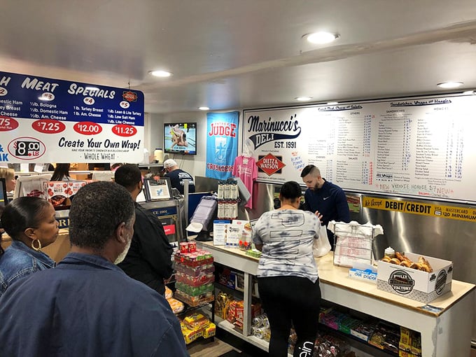 The lunch rush ballet: where hungry customers and sandwich artists perform their daily dance of deliciousness.