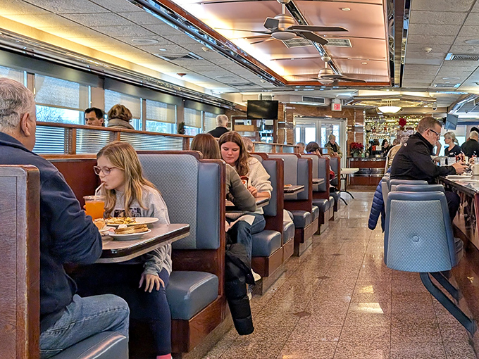 The morning symphony of Minella's—where regulars and first-timers share the universal language of "pass the syrup, please."