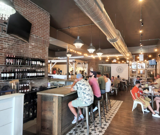 The buzz of satisfied diners creates the perfect soundtrack for a meal that brings people together over exceptional food.