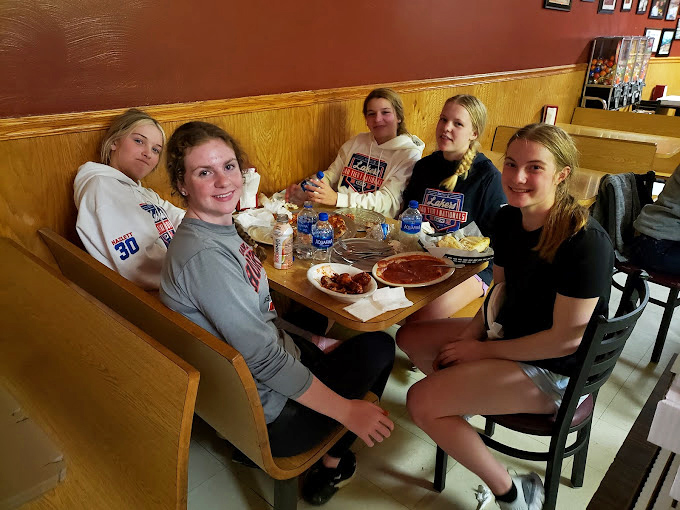 Every great pizzeria has tables filled with people making memories over melted cheese. These moments last longer than the pizza ever will.