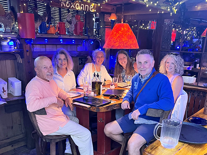 Happy diners sharing moments that prove good food creates the best kind of family memories.