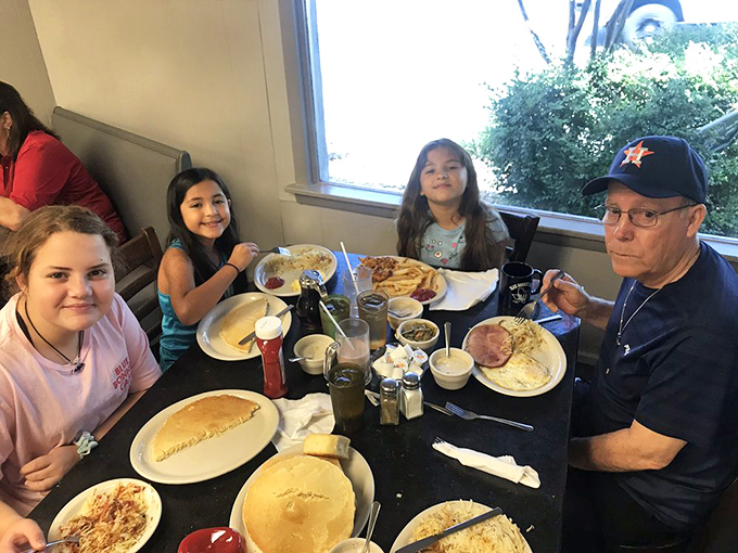 Multi-generational dining at its finest: where pancakes create lasting family memories together.