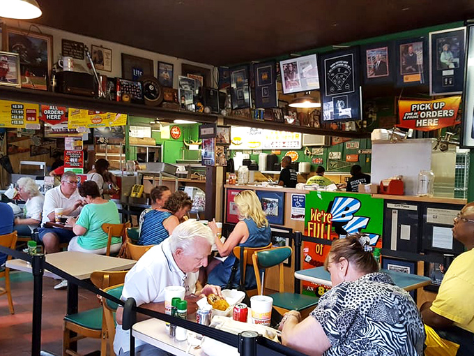 The bustling dining room where strangers become friends over shared food obsessions. Everyone here is united by the universal language of "mmmmm."