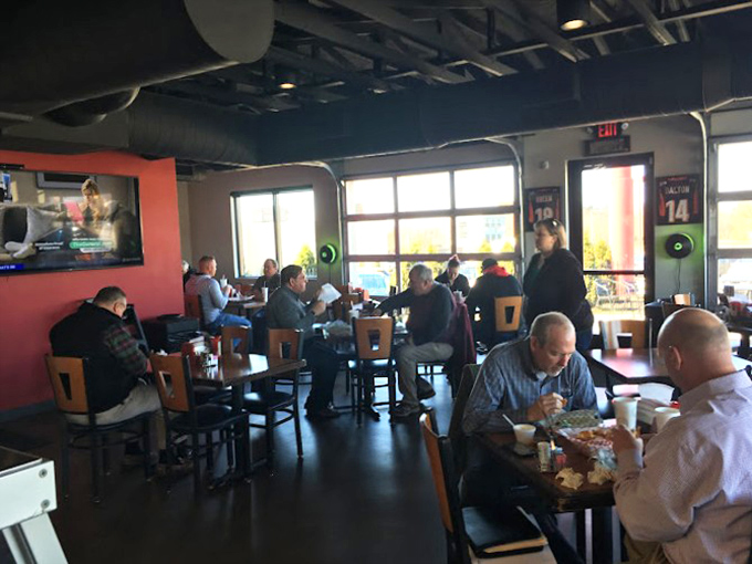 The universal language of BBQ brings together a diverse crowd. Notice the absence of conversation&mdash;everyone's too busy experiencing meat nirvana.