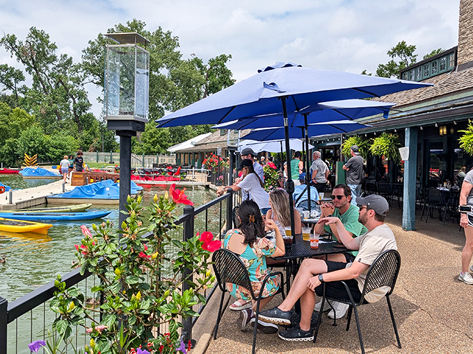 The patio at The Boathouse proves that sometimes the best seasoning is sunshine, fresh air, and a view that makes you forget to check your phone.