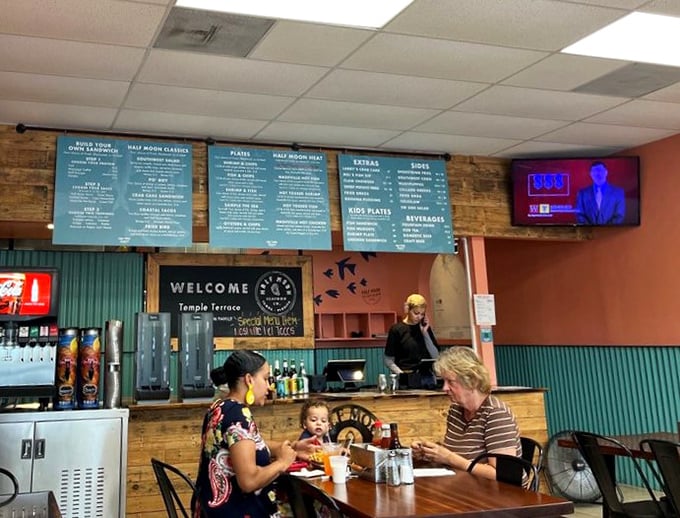 The best seafood joints always have families making memories over meals. That little one might be experiencing their first hushpuppy epiphany.