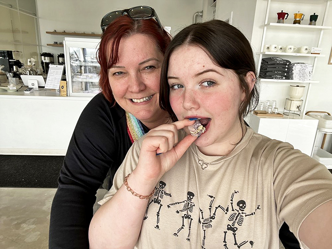 The universal expression of macaron joy knows no age limit. That first perfect bite always triggers the same involuntary smile.