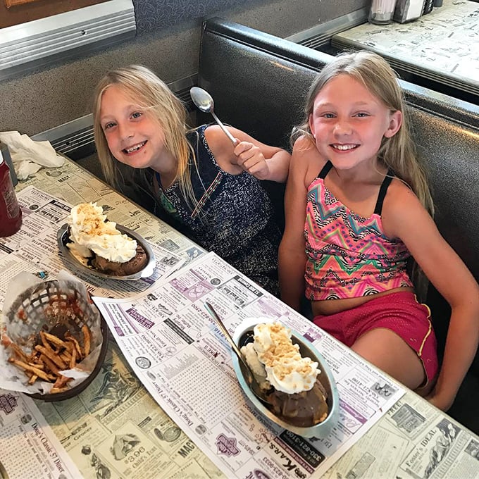 The look of pure joy when kids discover real diner desserts. No iPad games necessary when there's chocolate and whipped cream involved.