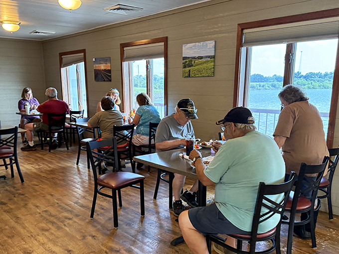 Where locals gather to enjoy lake views and hearty meals. Notice how nobody's looking at their phones&mdash;the food commands full attention.
