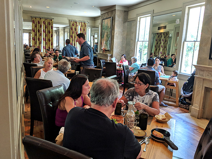 The happiest room in Charleston? Diners engaged in that universal language of "mmm" and "you've got to try this" amid Husk's refined Southern setting.