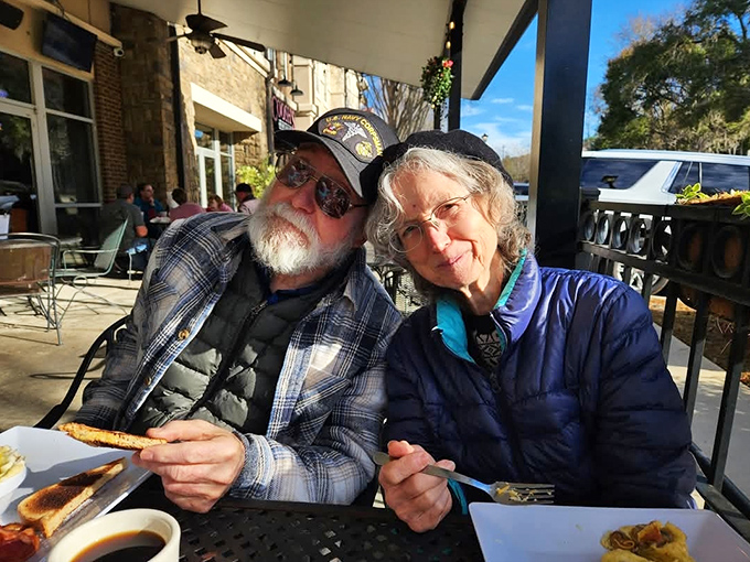 The outdoor patio: where happy diners soak up Florida sunshine between bites of &eacute;touff&eacute;e and sips of sweet tea.