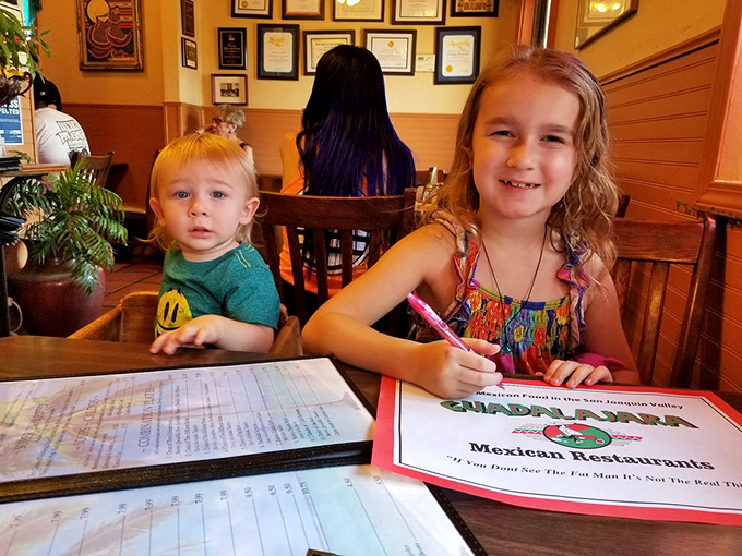 Kids coloring on menus&mdash;the universal sign you've found a place where families have been making memories over meals for generations.