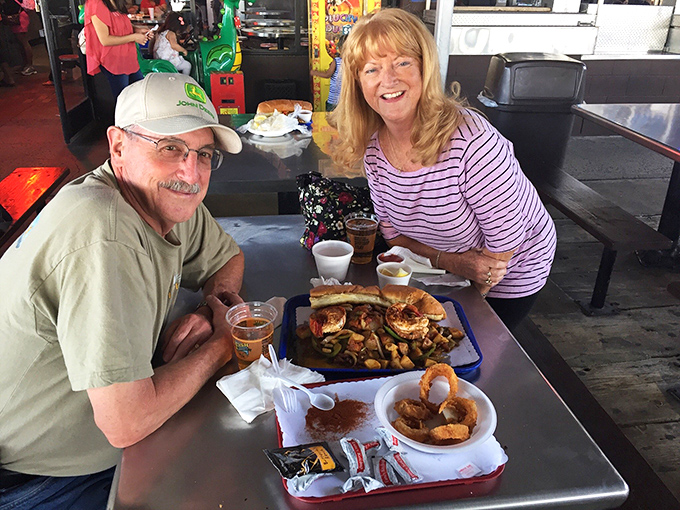The universal language of seafood satisfaction &ndash; these diners have found their happy place among the shrimp and sunshine.