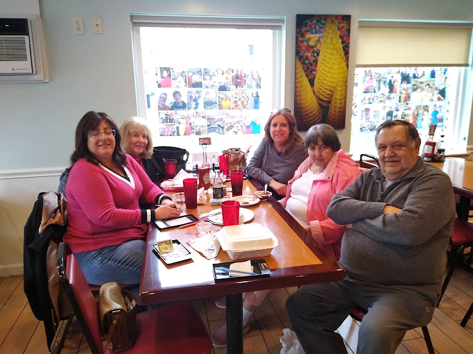 At Clay's, the tables fill with multi-generational gatherings where smartphones stay pocketed and conversation flows as freely as the coffee.