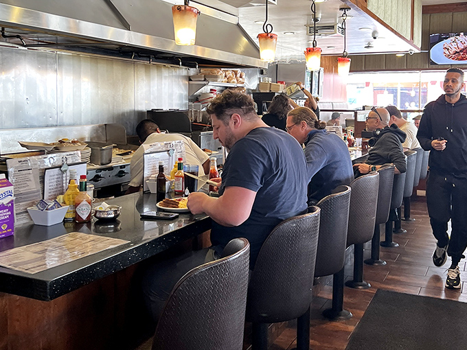 The counter seats&mdash;where solo diners become food critics and the short-order ballet unfolds before your eyes.