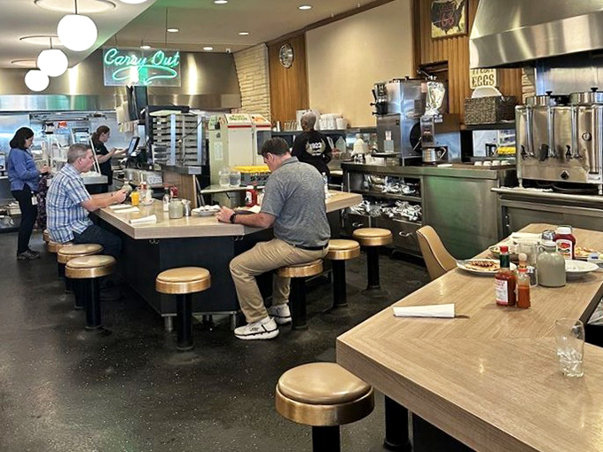 The counter seating offers front-row tickets to the breakfast ballet, where short-order cooks perform choreographed culinary magic without missing a beat.