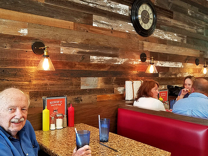 The universal language of contentment: people enjoying good food in comfortable surroundings.
