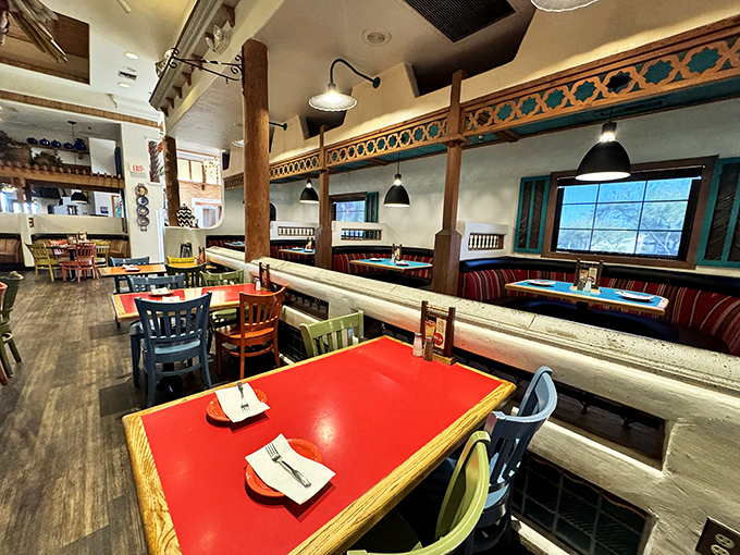 Multi-level dining with exposed beams creates an atmosphere where every meal feels like a celebration.