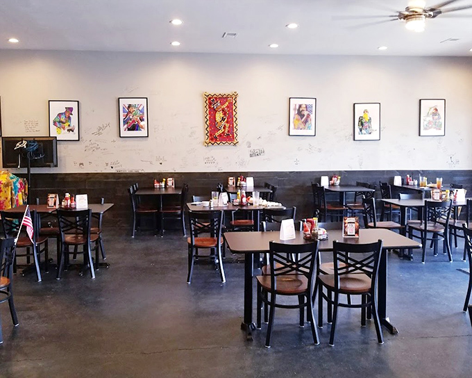 Simple tables, comfortable chairs, and walls adorned with character&mdash;this dining room invites you to settle in and forget your diet.
