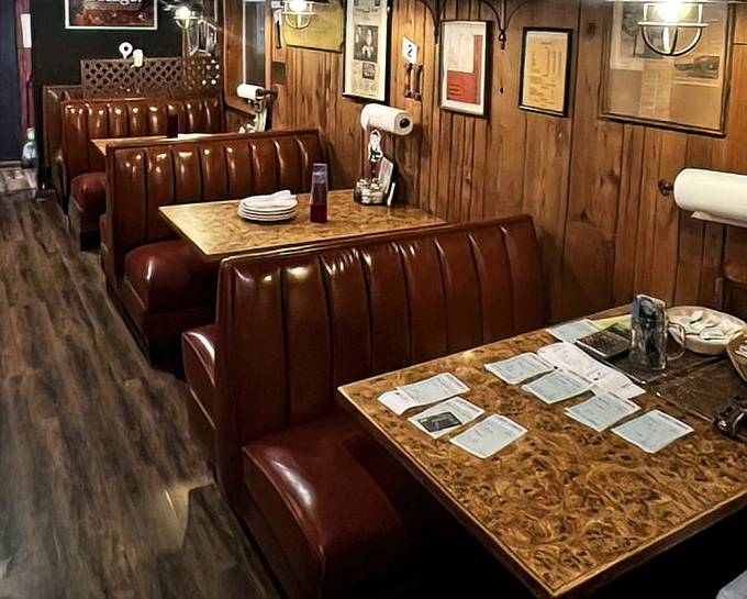 These burgundy booths have cradled the posteriors of pizza pilgrims from around the world. Wood paneling: not trendy, just timeless.