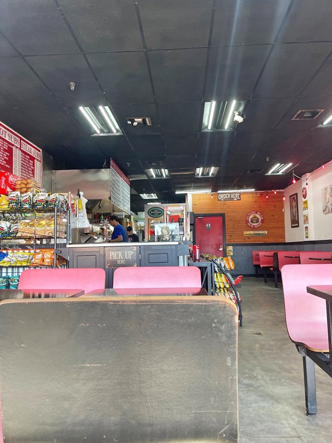 The dining area offers no-nonsense seating where the only distraction from your sandwich is watching others enjoy theirs. Function over flash.