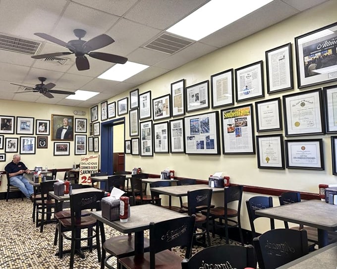 The wall of fame tells stories of satisfied customers past. In this room, calories don't count and diet plans come to die.