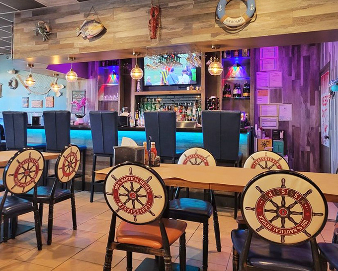 Ship wheel chairs and blue lighting create the perfect maritime mood. Like dining in a stylish captain's quarters, minus the seasickness.