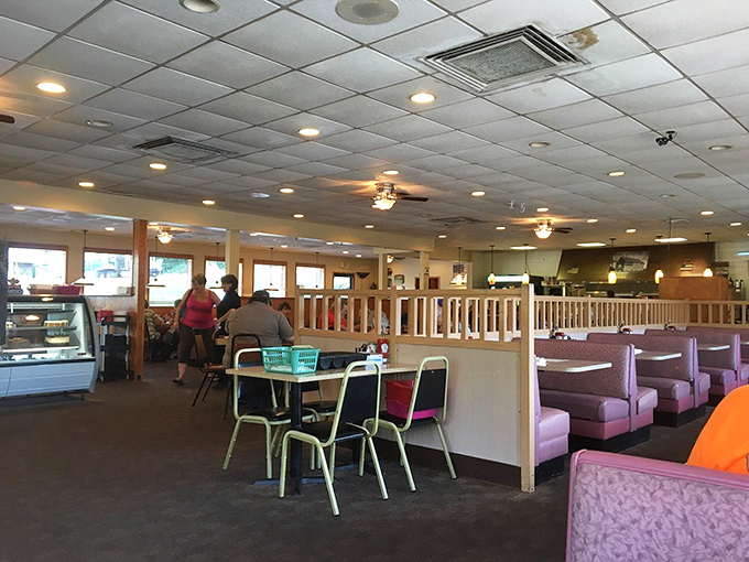 The dining area's wood paneling and booth seating create that perfect time-capsule feeling where comfort and nostalgia are always on the menu.