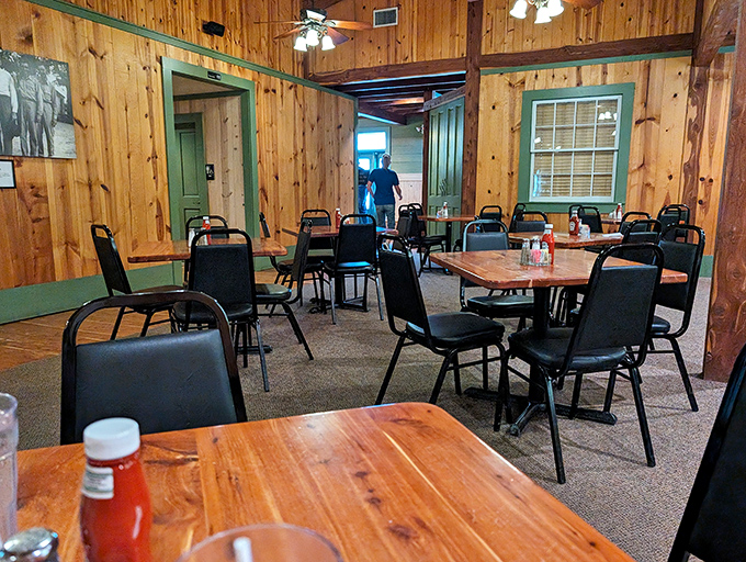 The dining room whispers "come as you are" with its unpretentious wooden tables and chairs&mdash;Texas hospitality in architectural form.