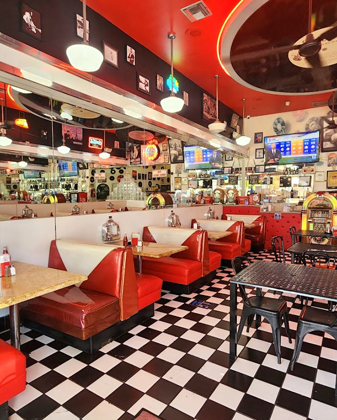 Not just a dining room but a museum of Americana where the exhibits include red booths, checkered floors, and memories waiting to be made.