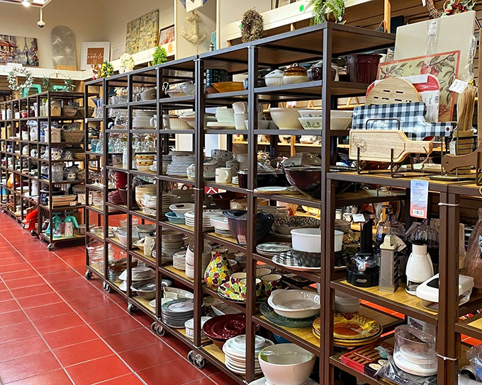 Dish department extraordinaire! Rows upon rows of plates, bowls, and serving pieces waiting to host your next dinner party.