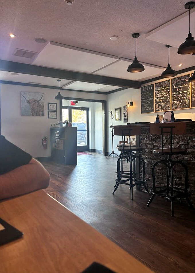 Modern meets rustic in this stylish exit. The Peddler&rsquo;s contemporary bar area offers a final moment of mountain chic as guests leave the warm, wood-paneled dining space behind.