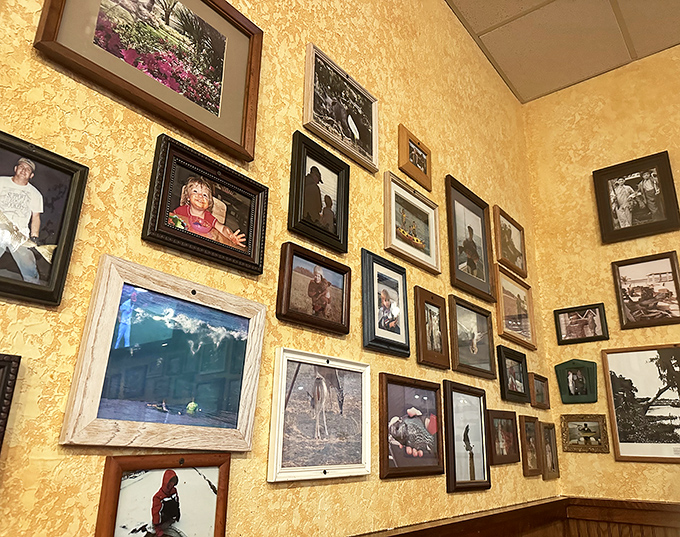 Every photo tells a story on these walls – a visual guestbook of satisfied customers and local memories spanning generations.