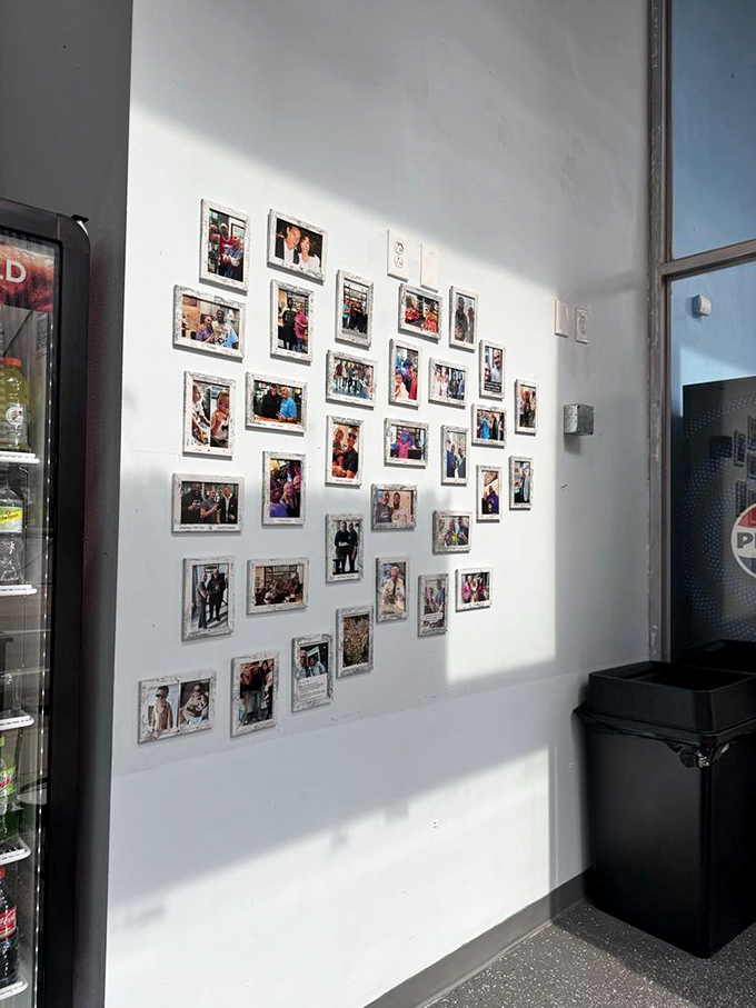 The wall of customer photos tells stories of first bites and return visits&mdash;a modern shrine to sandwich satisfaction in the City of Brotherly Love.