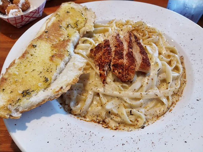 Comfort food gets the coastal treatment. That garlic bread looks like it could solve most of life's problems.