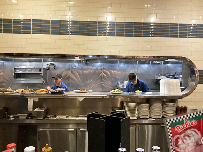 The open kitchen design isn't just practical&mdash;it's dinner theater where the stars are your breakfast and the soundtrack is sizzling perfection.