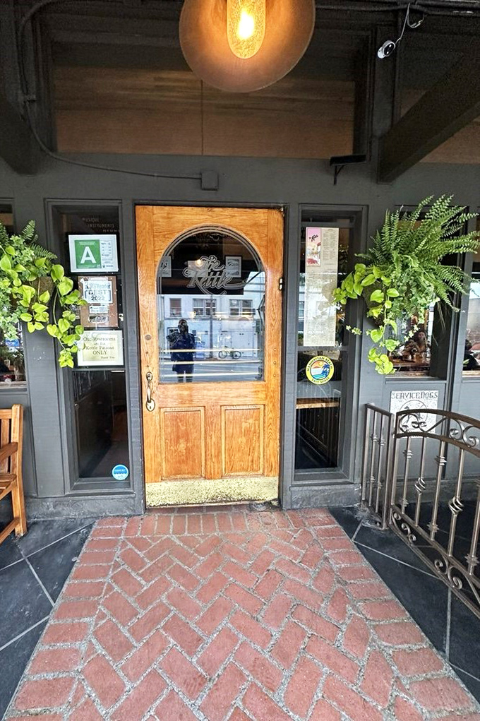 The wooden door with its etched glass kettle logo isn't just an entrance&mdash;it's a portal to comfort food nirvana that's welcomed generations.