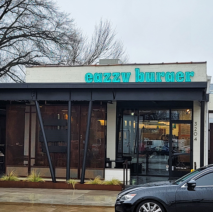 Rain or shine, that turquoise sign promises the same thing: a burger experience worth crossing town for.