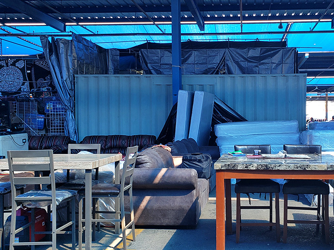 Living room sets that have seen other living rooms wait for their next chapter. That couch has stories to tell&mdash;some best left untold.