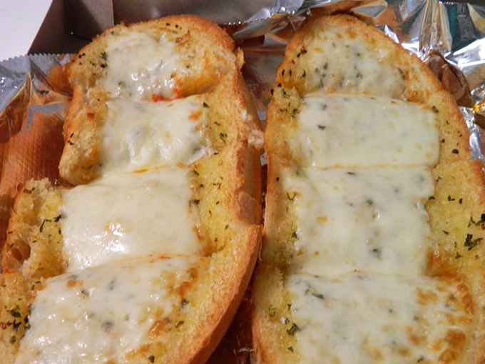 Garlic bread that means business. Golden, buttery, and cheesy&mdash;the supporting actor that sometimes steals the whole show.