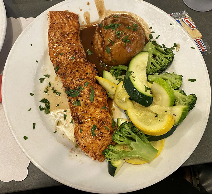 Salmon that looks like it jumped from stream to plate, seasoned so perfectly even fish-skeptics might convert.