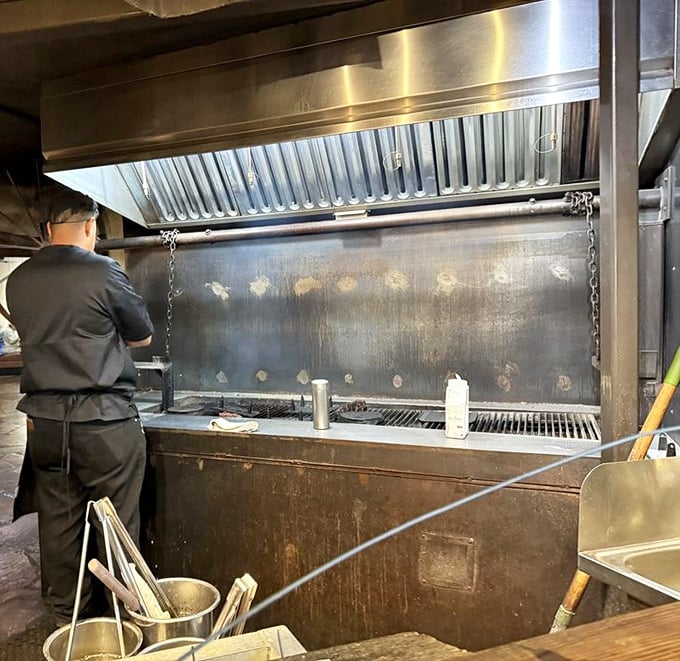 The mesquite grill: where steaks achieve their destiny and every chef becomes a conductor in a symphony of sizzle.