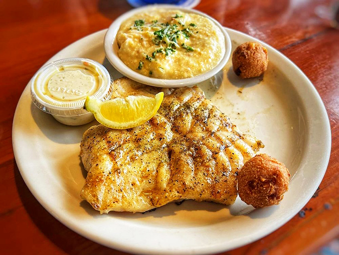 Perfectly grilled grouper that makes you wonder if mermaids are secretly working in the kitchen. The answer is probably yes.