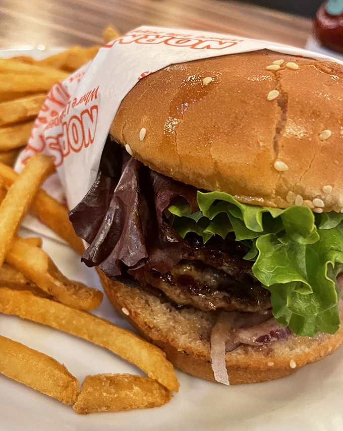 This isn't just a burger; it's a monument to American ingenuity, where beef, bun, and toppings achieve perfect harmony.