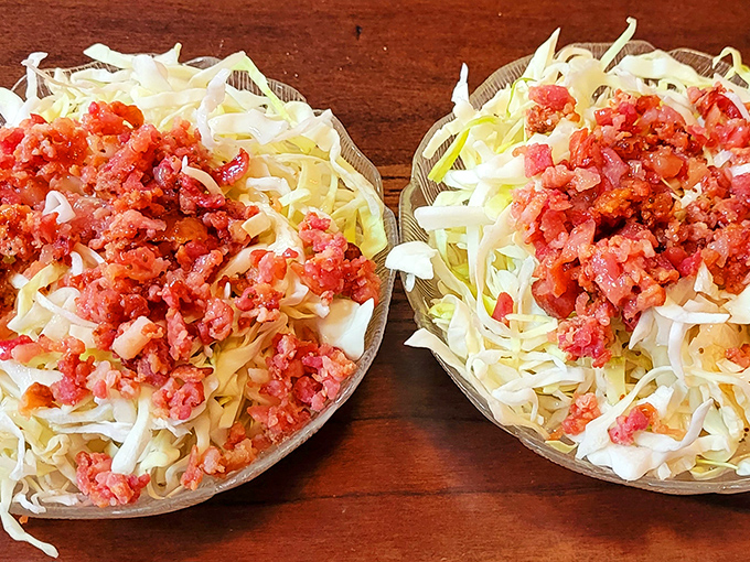 Hot bacon slaw that proves cabbage can be exciting. This isn't your cafeteria coleslaw&mdash;it's a revelation of texture and smoky-sweet harmony.