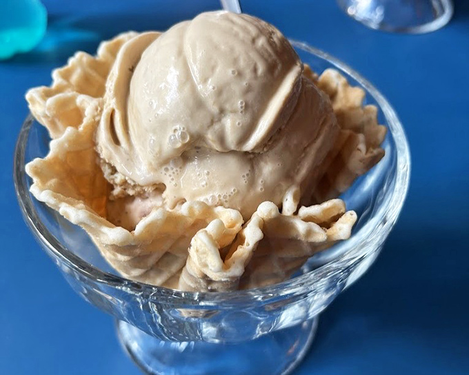Ice cream nestled in a homemade waffle bowl&mdash;proof that the best things in life come in edible containers.