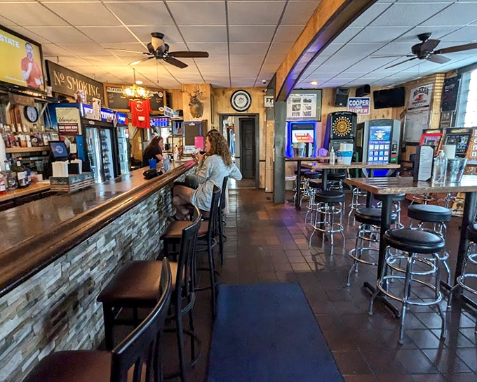 The bar area&mdash;where strangers become friends and friends become family. That worn wooden counter has heard more small-town stories than the local newspaper.
