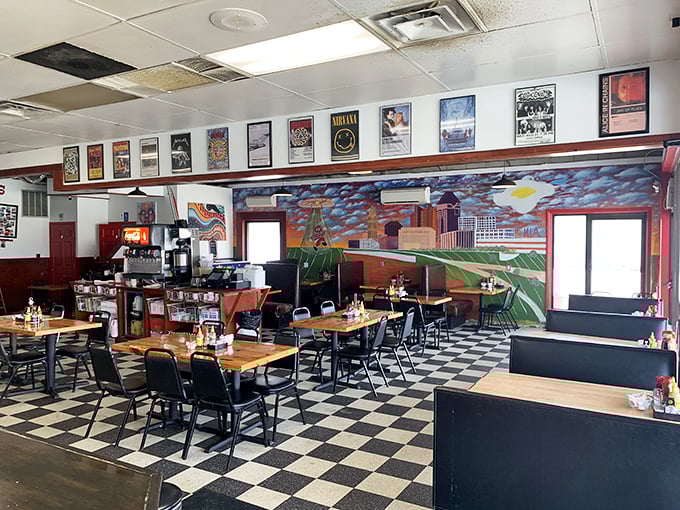 The open kitchen lets you witness the breakfast ballet happening behind chrome and steel.