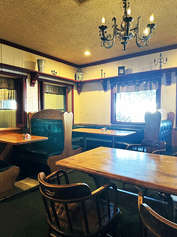 Wooden booths beneath chandeliers create dining nooks where calories don't count and conversations flow as freely as the coffee.