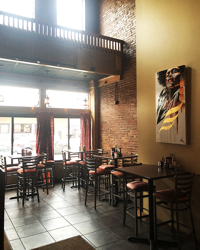 Soaring ceilings and artistic touches transform this space from restaurant to cultural experience, where food and ambiance dance in perfect harmony.